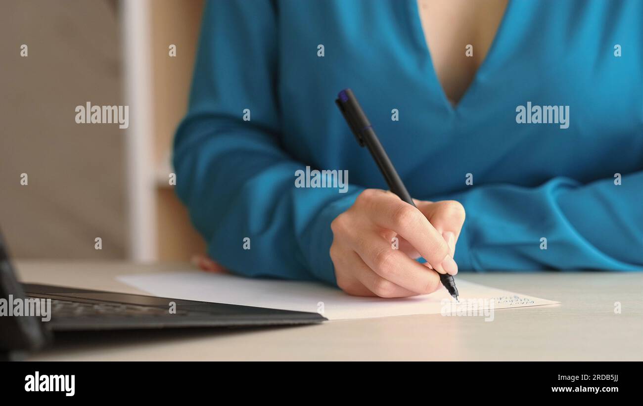Office paperwork woman hands writing paper desk Stock Photo - Alamy