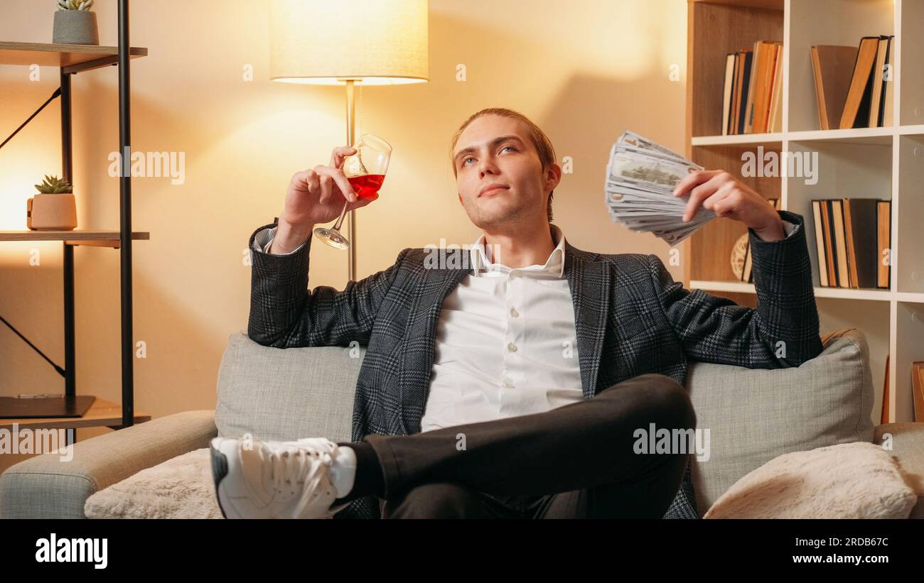 Millionaire lifestyle wealth dream rich guy money Stock Photo - Alamy