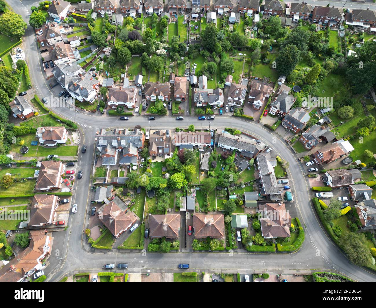 Aerial view of suburban houses and gardens in the urban city of ...