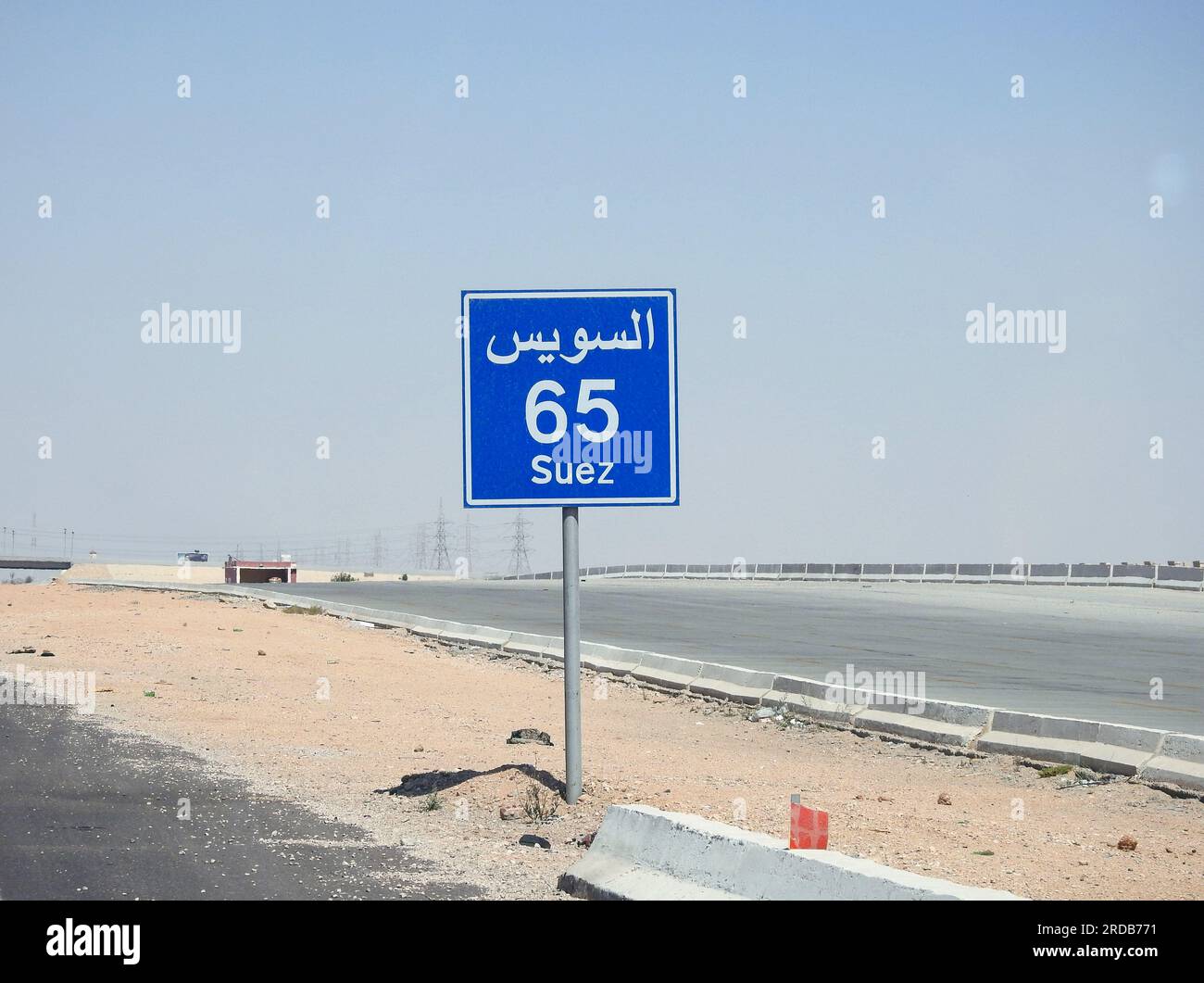 A road sign board in Suez Cairo highway gives the remaining distance to ...