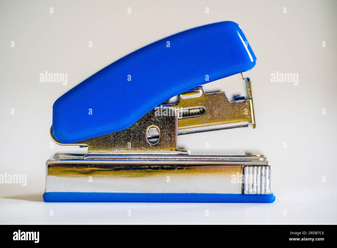 Small Blue stapler Stock Photo - Alamy