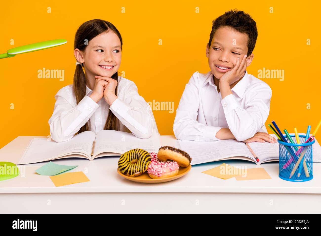 Photo of cute pupils clever students sit table ready for school lecture ...