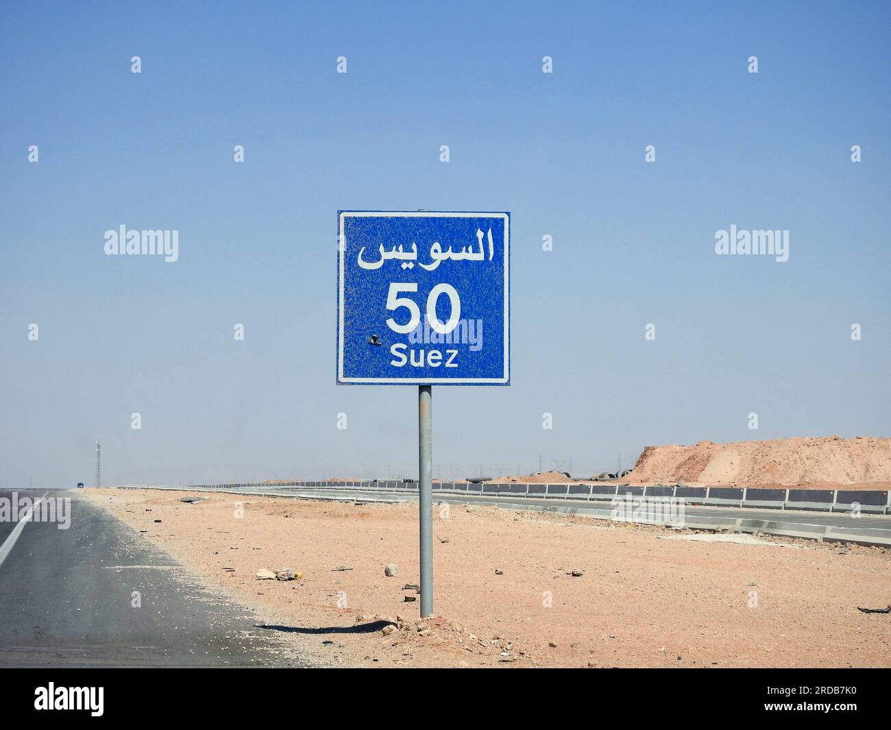 A road sign board in Suez Cairo highway gives the remaining distance to ...
