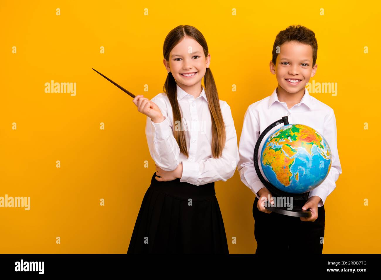 Photo of sweet positive preteen schoolchildren wear white shirts ...