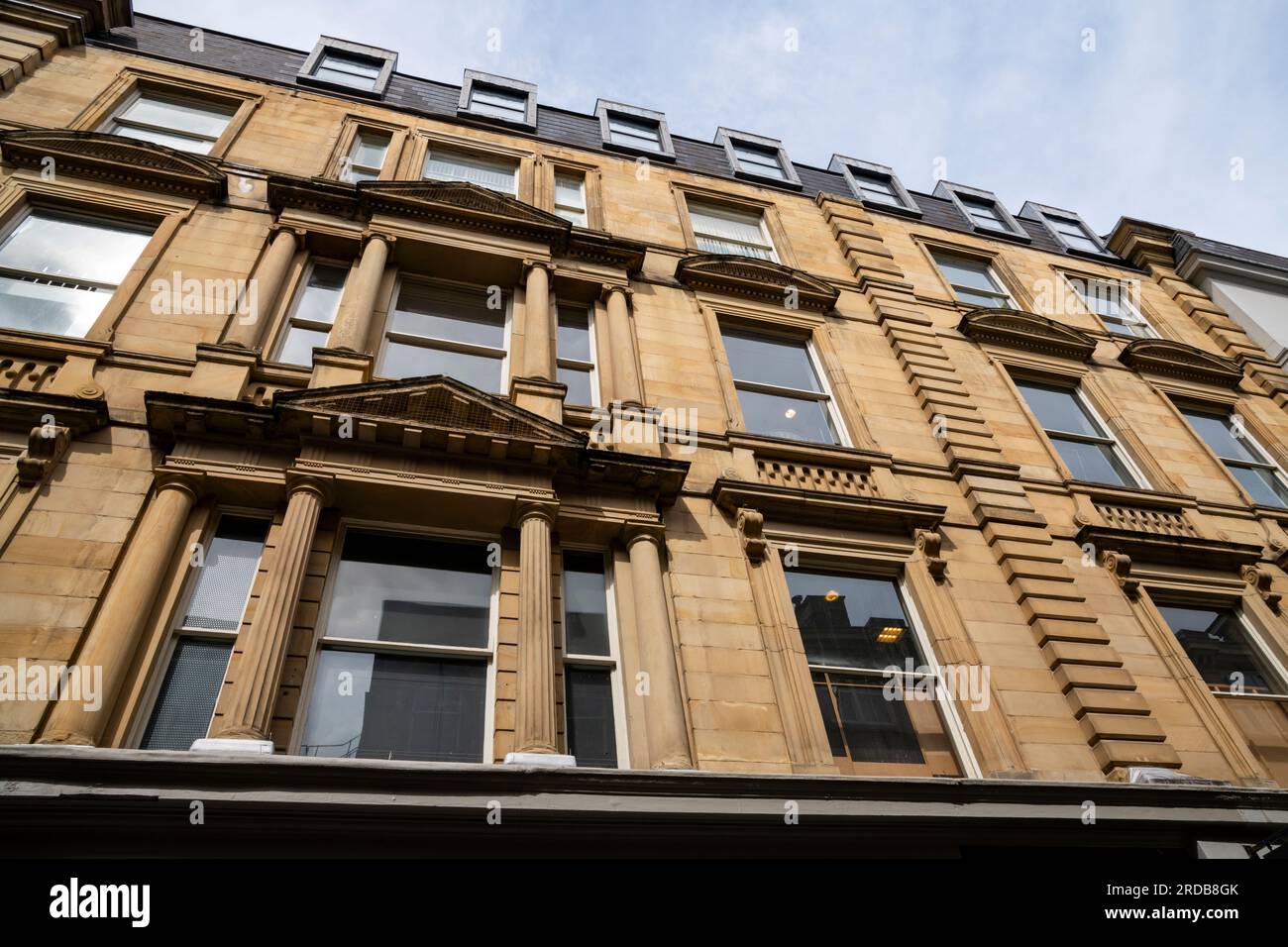 Windows on an old building in the centre of Manchester, Northern ...