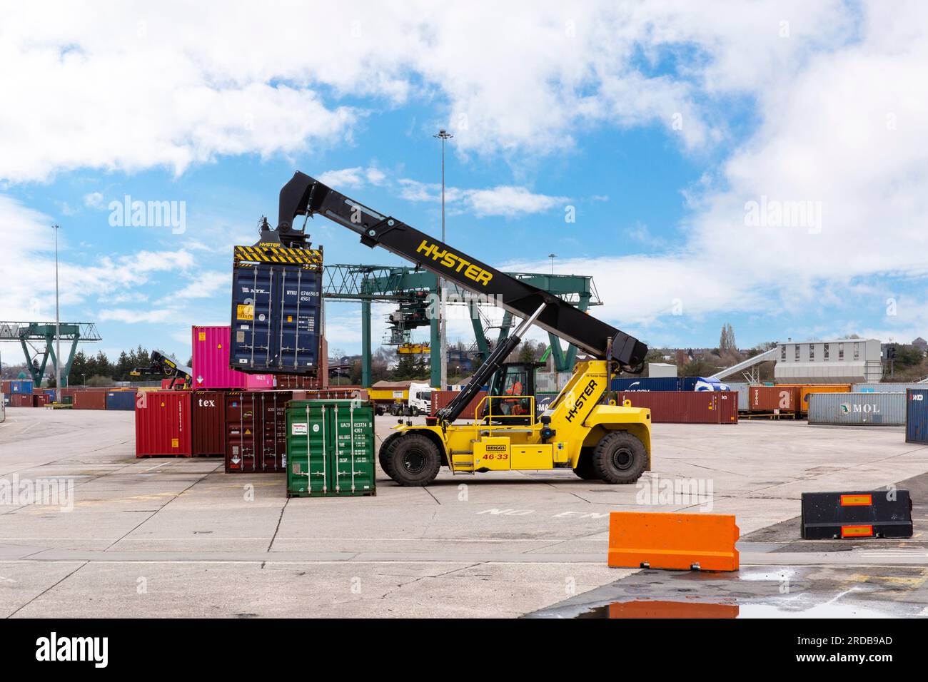 Shipping Containers being loaded onto HGV Vehicle at an inland ...