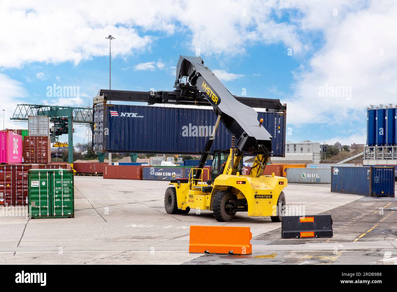 Shipping Containers being loaded onto HGV Vehicle at an inland ...