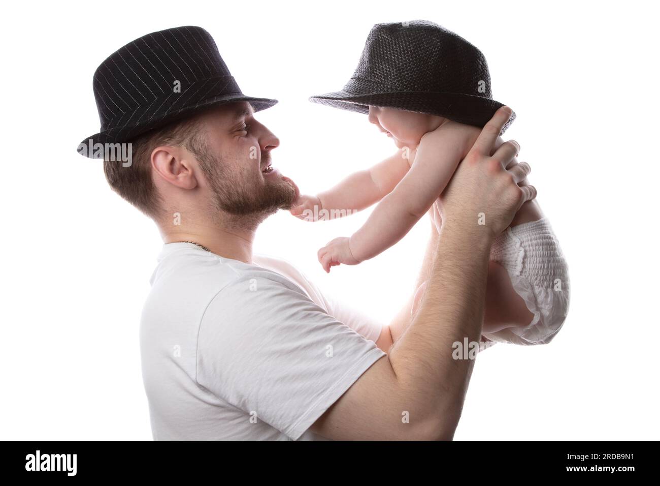 Funny father and kid in classic hats. Father and little son Stock Photo ...