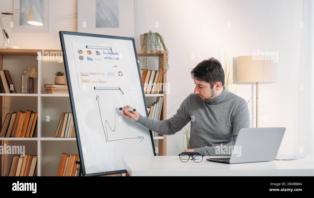 Charts presentation business statistics man graphs Stock Photo - Alamy