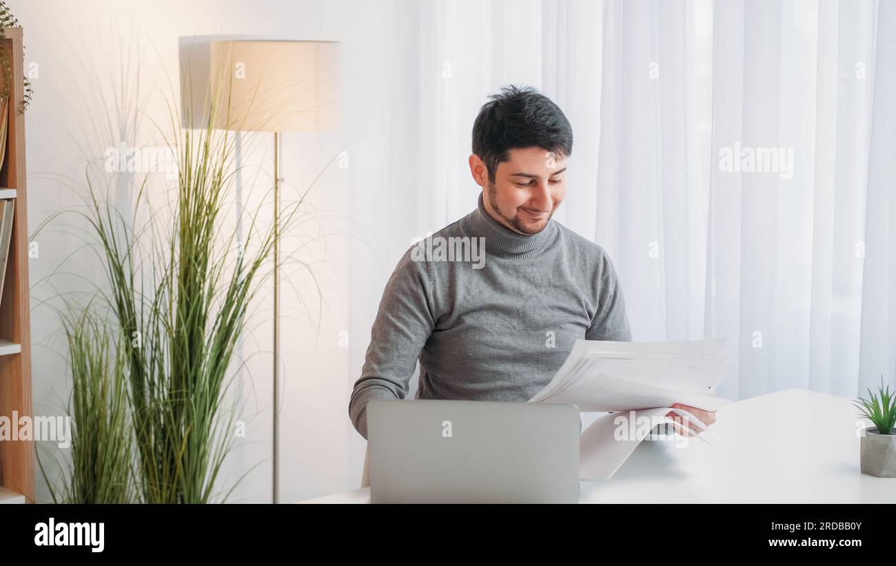 Happy employee work pleasure joyful man documents Stock Photo - Alamy