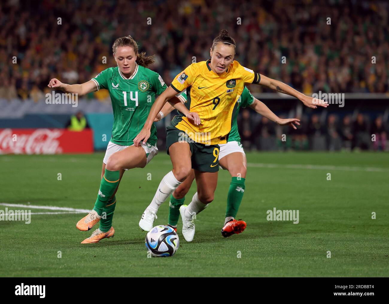 Australia's Caitlin Foord (right) and Heather Payne battle for the ball ...