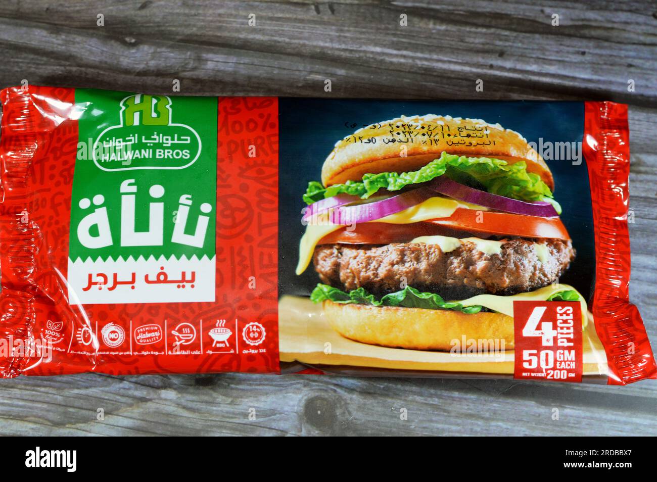 Cairo, Egypt, June 18 2023: Halwani Bros beef burger Haalwani packet ...