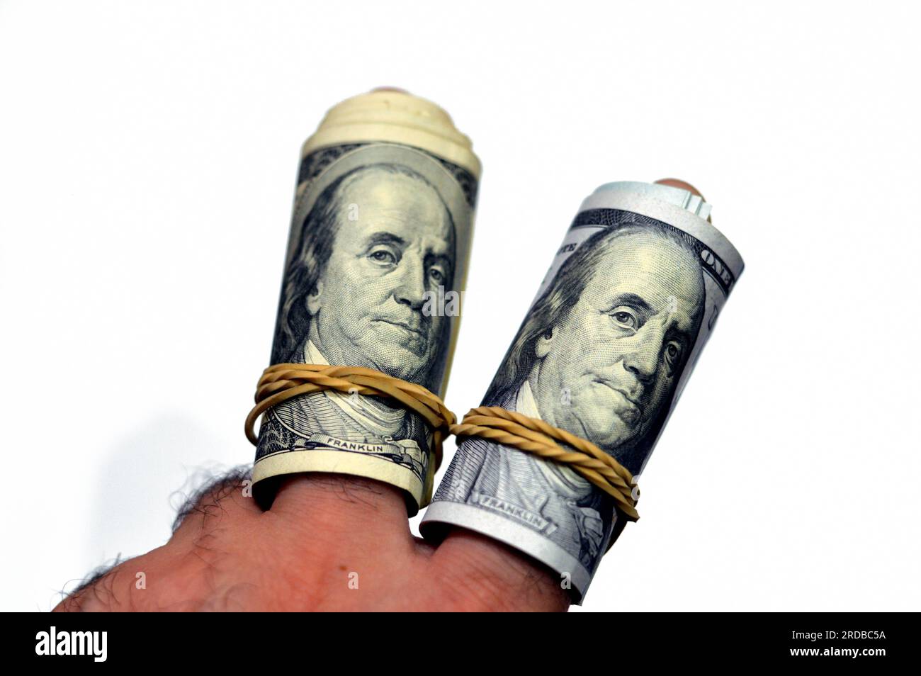 Rolls of 100 one hundred dollar banknote currency cash money old and ...