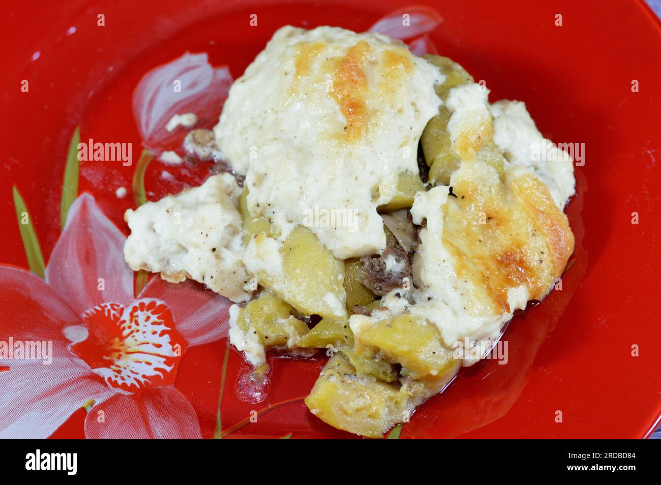 Baked zucchini courgette bechamel sauce and ground minced meat and ghee ...