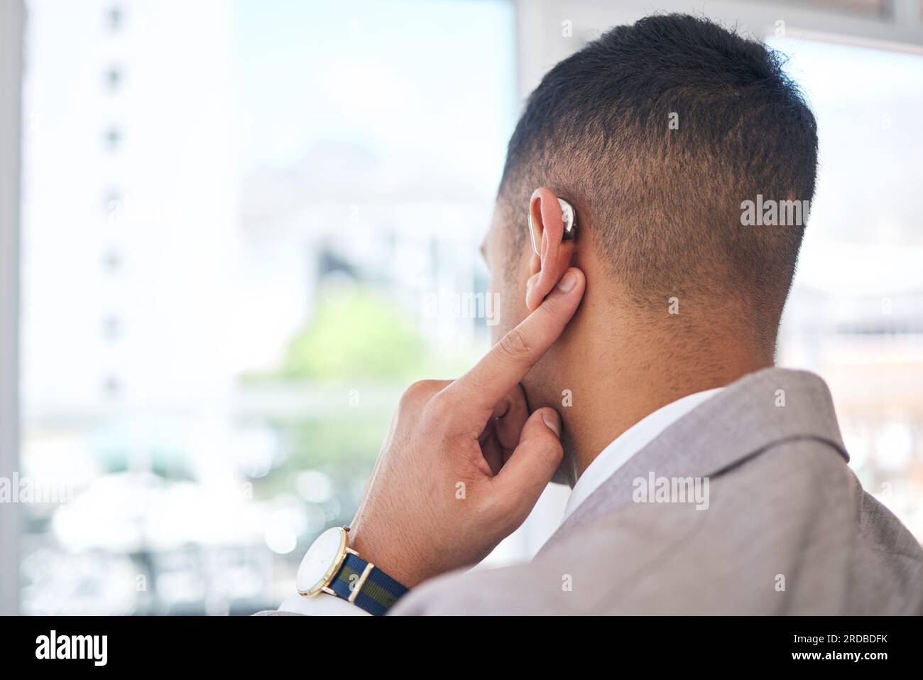 Back, business man and hearing aid for ear, sound amplifier and audio ...