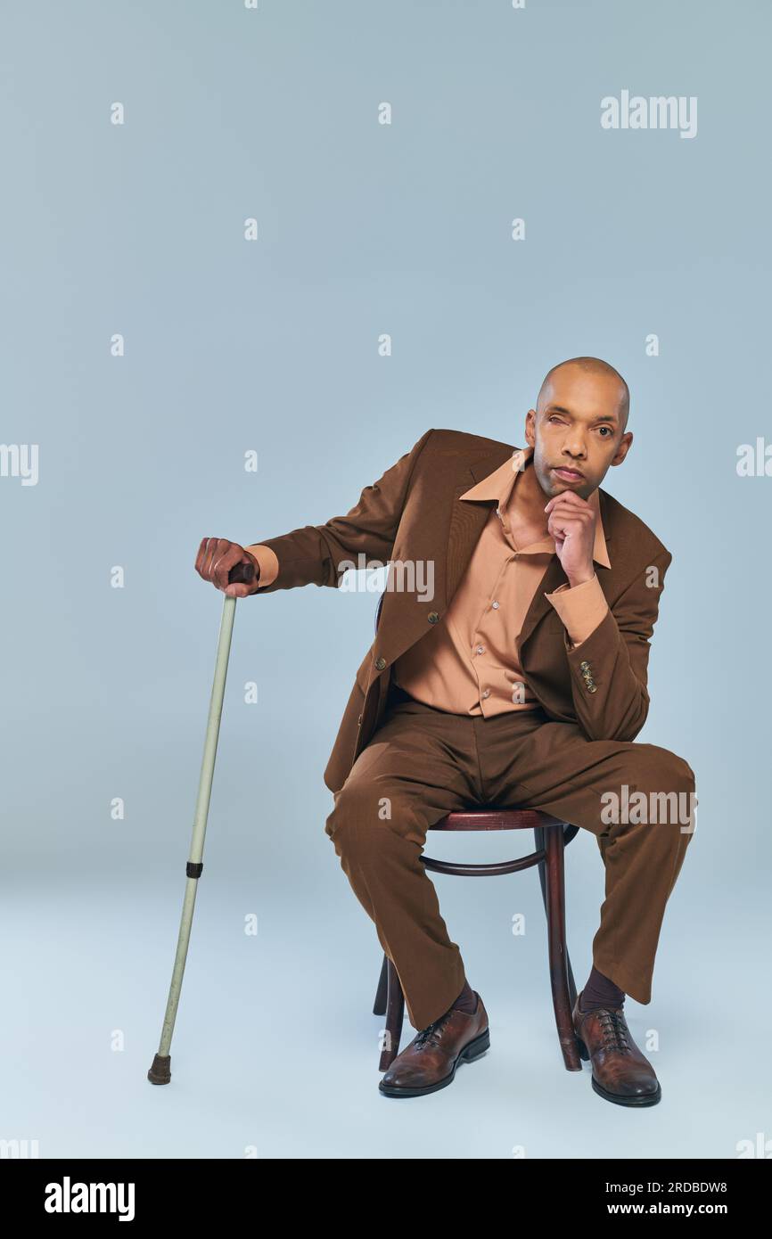 disability, full length of bold african american man with myasthenia ...