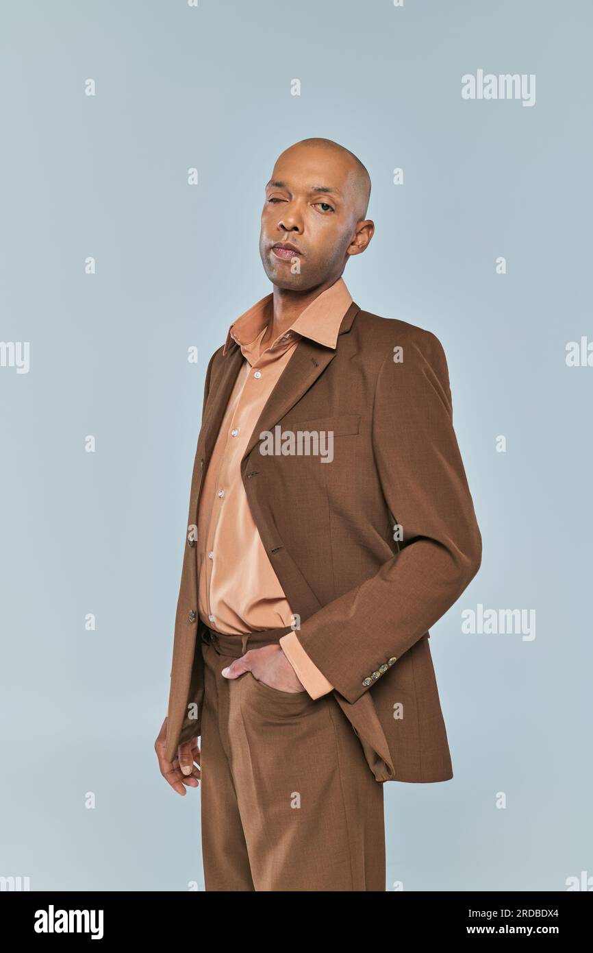 eye syndrome, bold african american man with myasthenia gravis standing ...