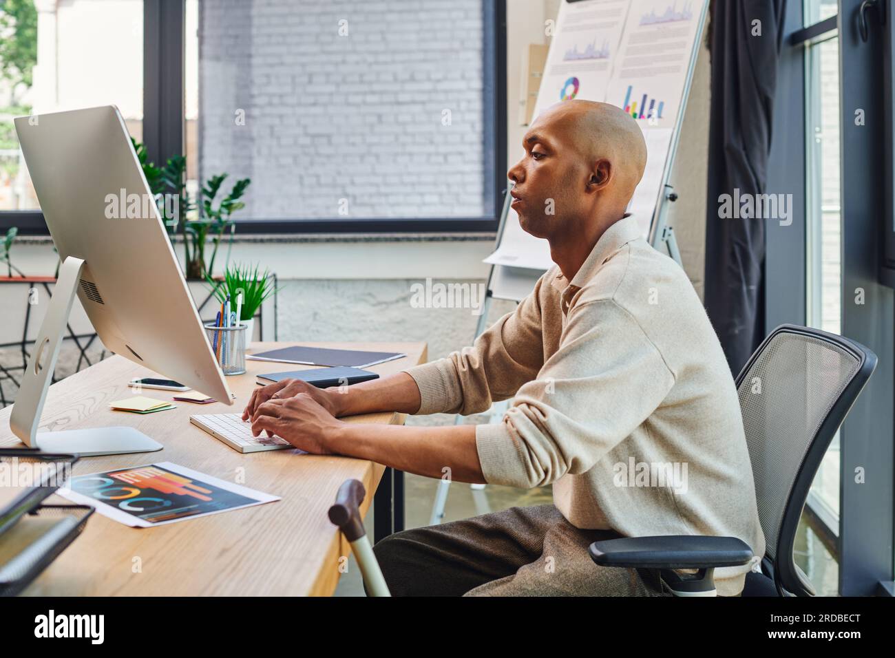 inclusion, african american man with myasthenia gravis at work, bold ...