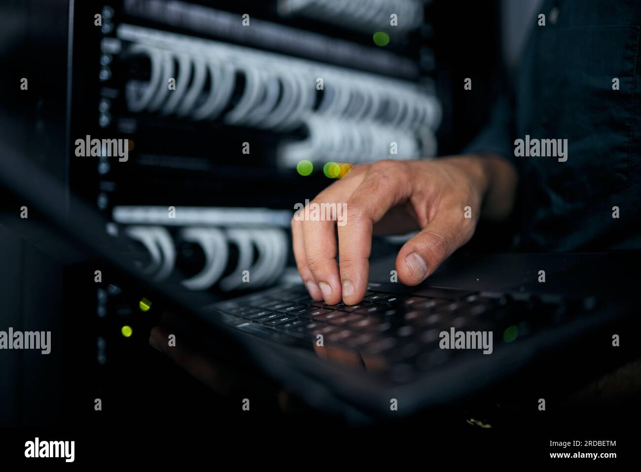 Database programmer typing server code hi-res stock photography and images - Alamy