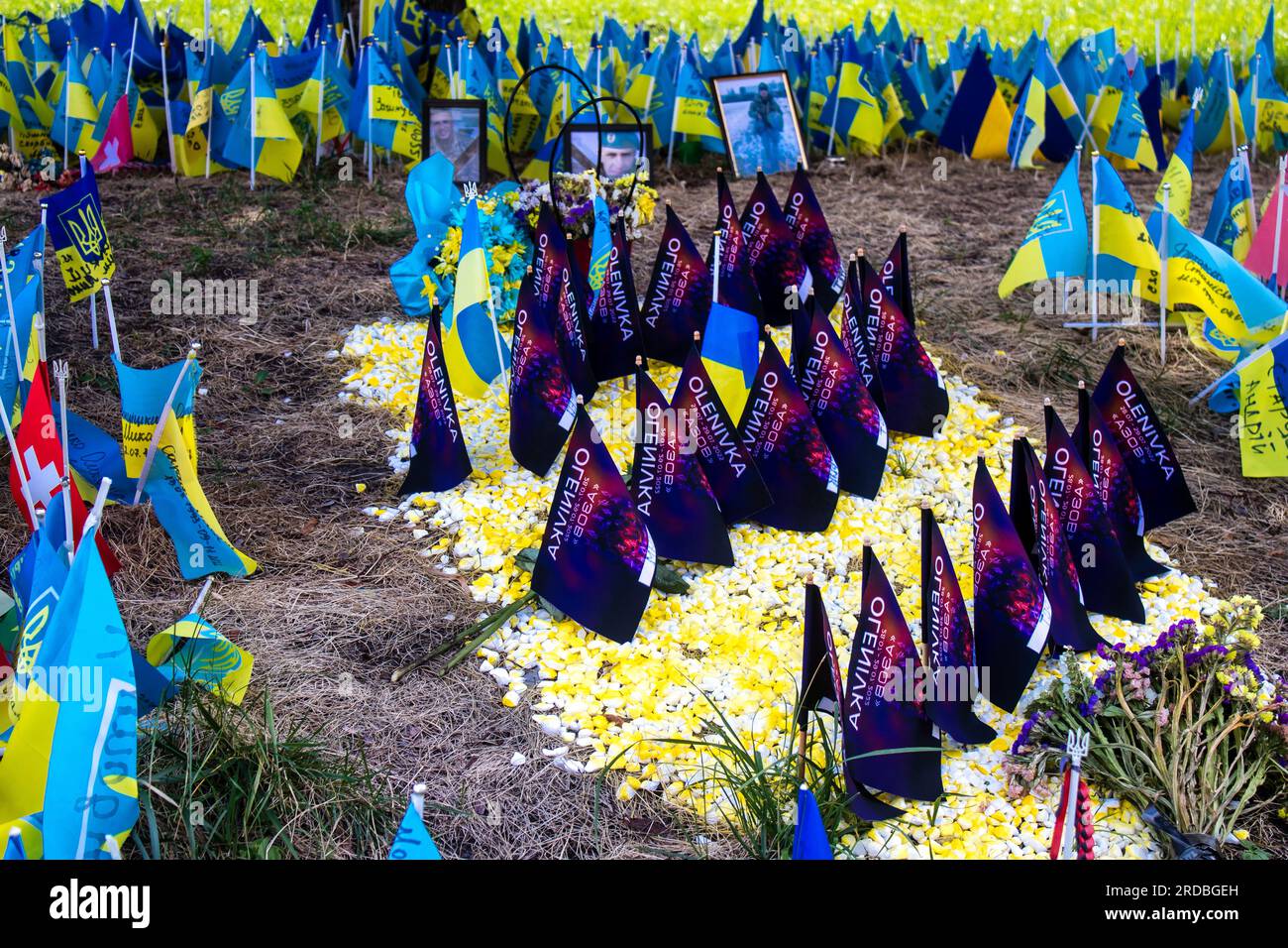 Thousands of flags have been planted at the makeshift memorial for ...