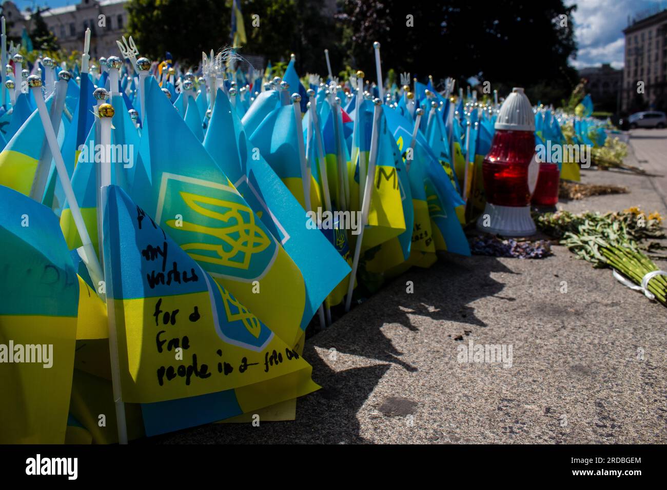 Thousands of flags have been planted at the makeshift memorial for ...