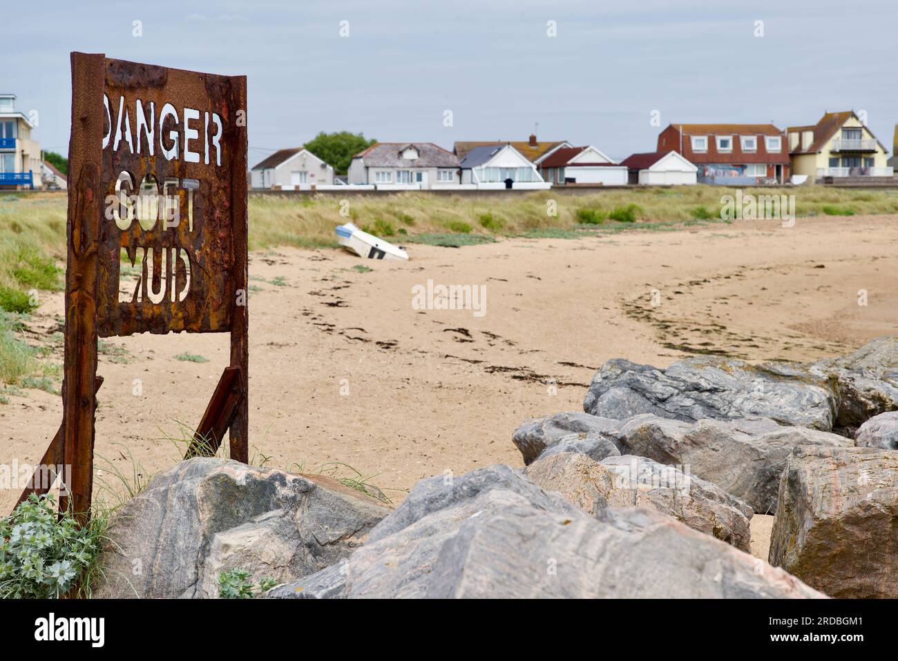 Danger Soft Mud warning sign on the beach Stock Photo - Alamy
