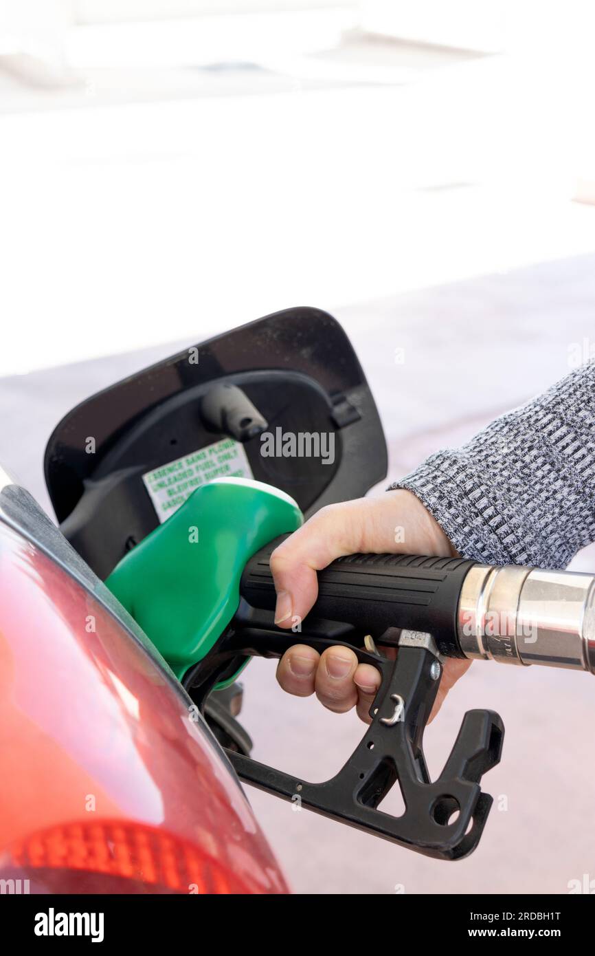 Woman filling fuel in hi-res stock photography and images - Alamy