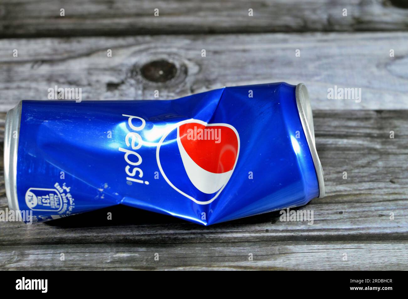 Cairo, Egypt, June 24 2023: Crushed Pepsi can, Cola flavor plastic ...