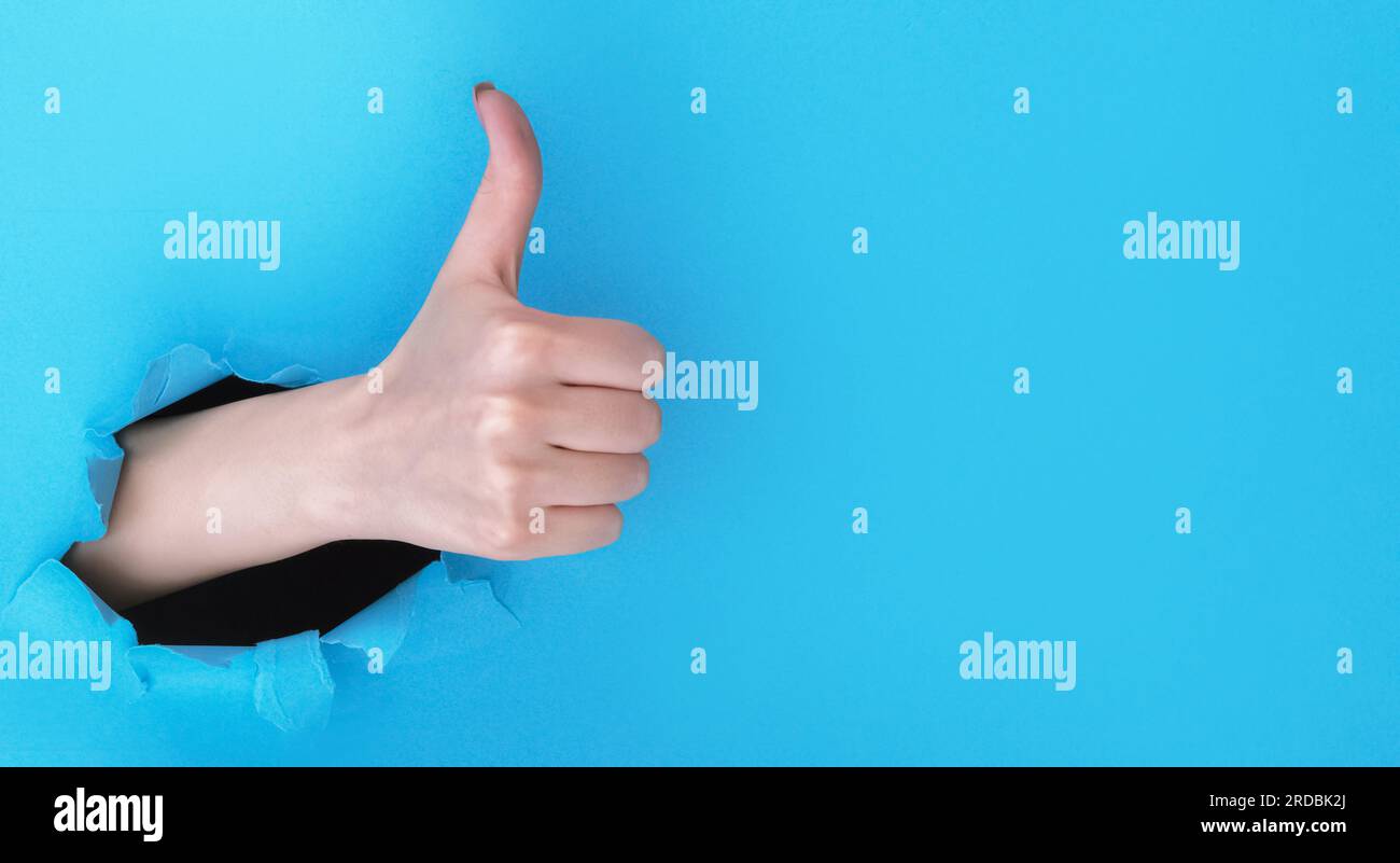Approval like. Well done. Super excellent. Female hand showing thumb up ...