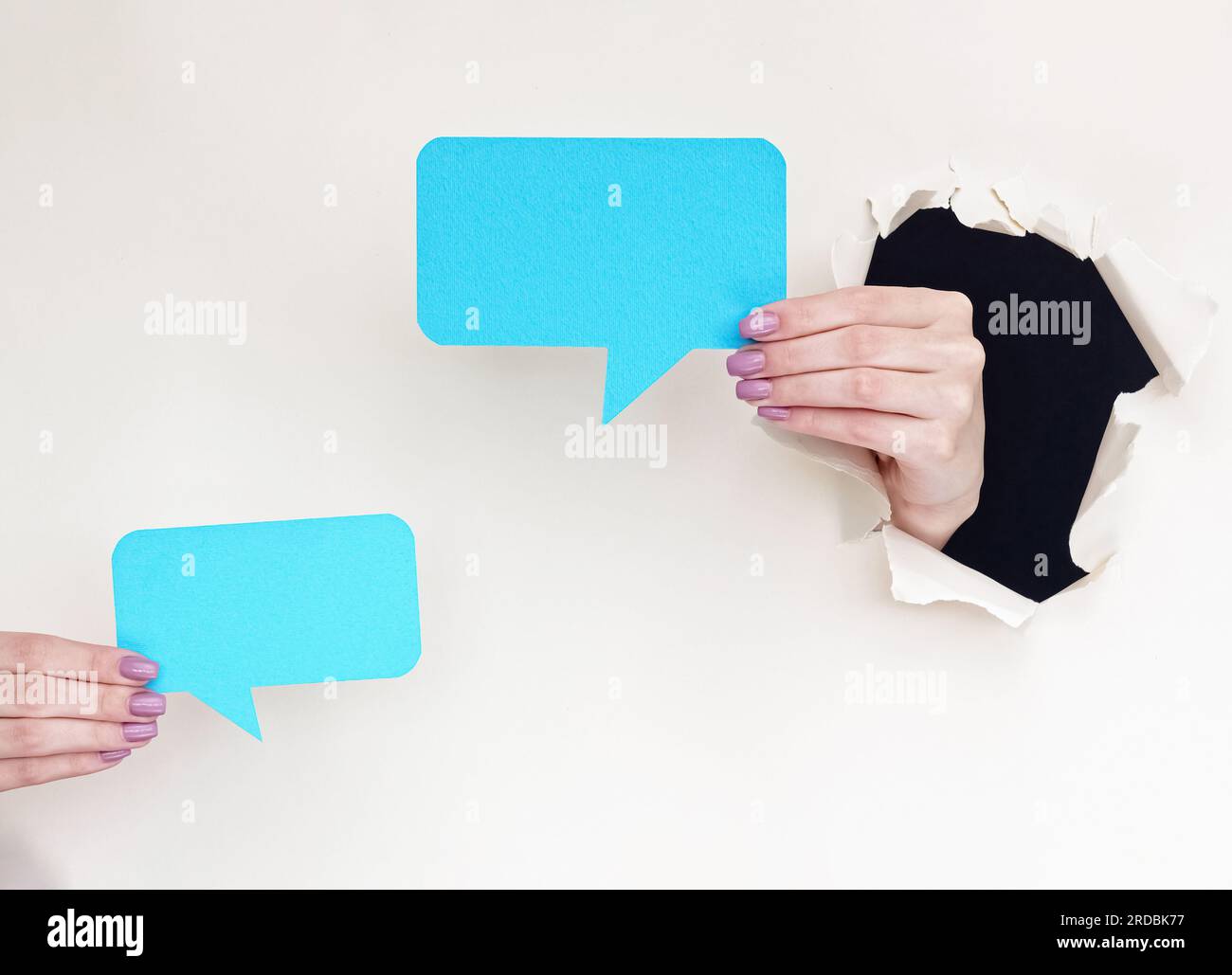 Dialogue icon. Blank speech bubble. Female hands inside breakthrough ...