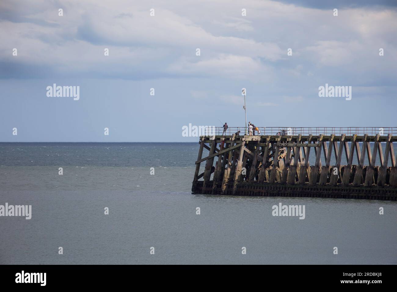 People fishing on Blyth Pier Northumberland Stock Photo - Alamy