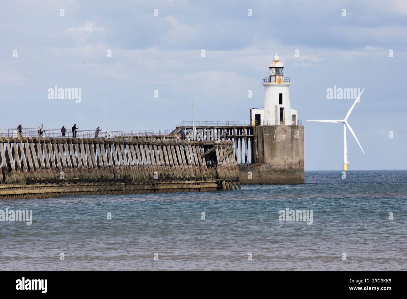 Blyth Pier Lighthouse and offshore wind turbine, Northumberland Stock ...