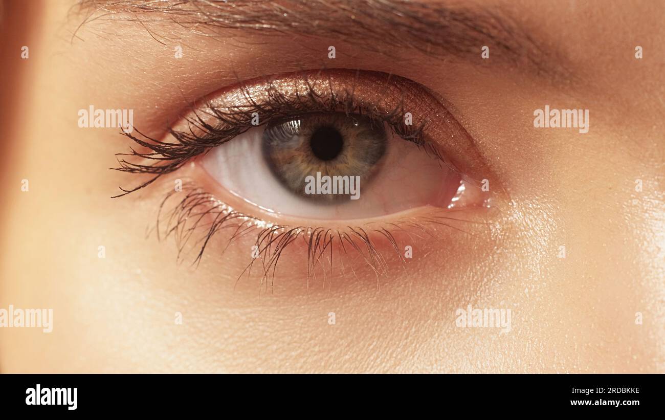 Vision correction laser surgery woman eye pupil Stock Photo - Alamy
