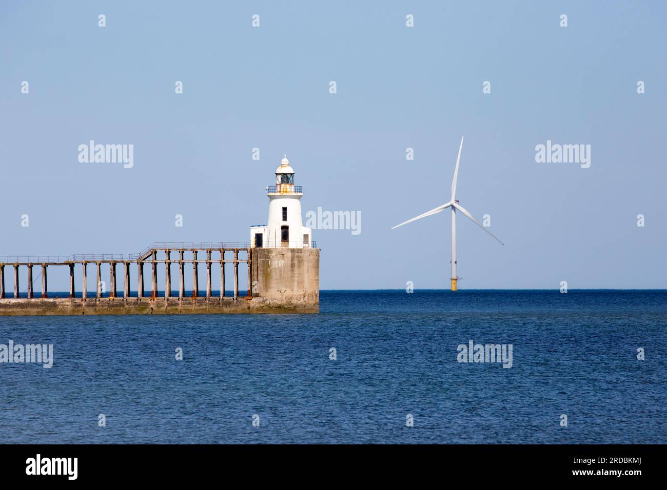 Blyth Pier, Lighthouse and offshore wind turbine, Northumberland Stock ...