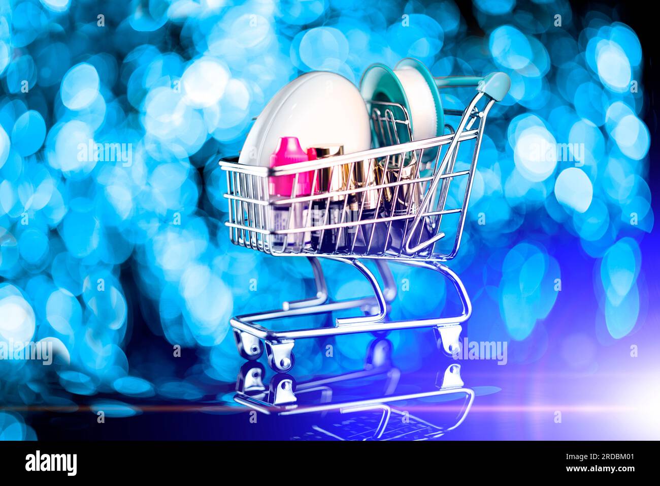 Shopping cart full of purchases. Shopping cart filled with small ...