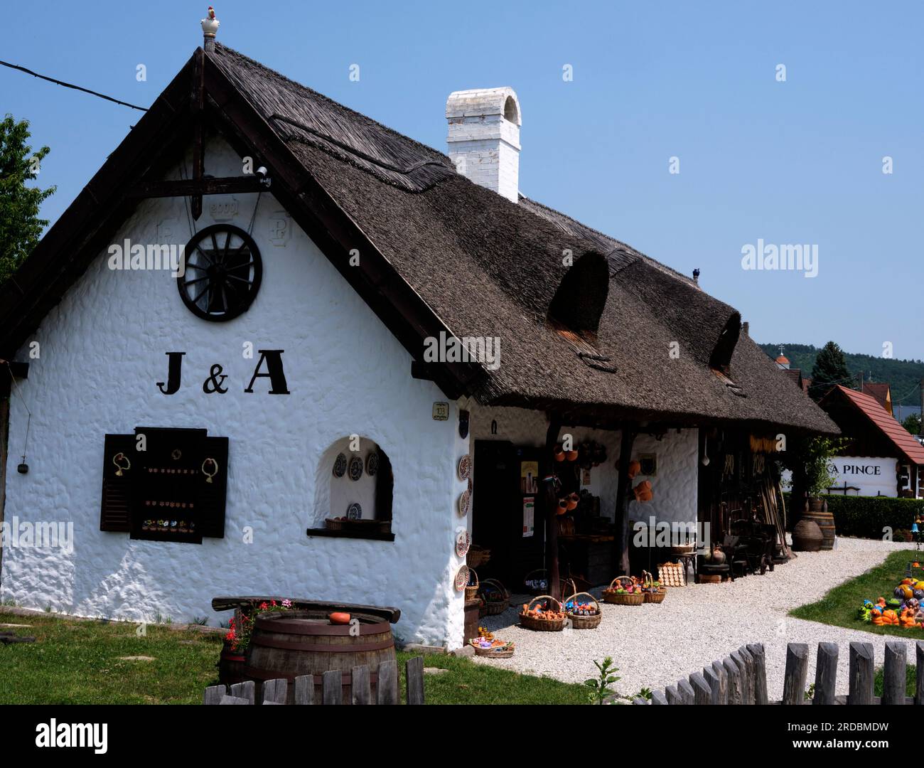 Pretty traditional thatched roof houses Stock Photo - Alamy