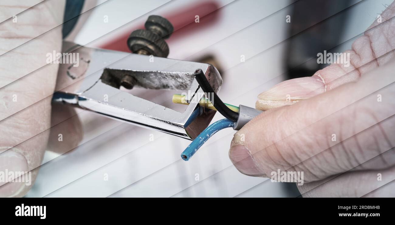 Action to strip a wire with a wire stripper, closeup, geometric pattern ...
