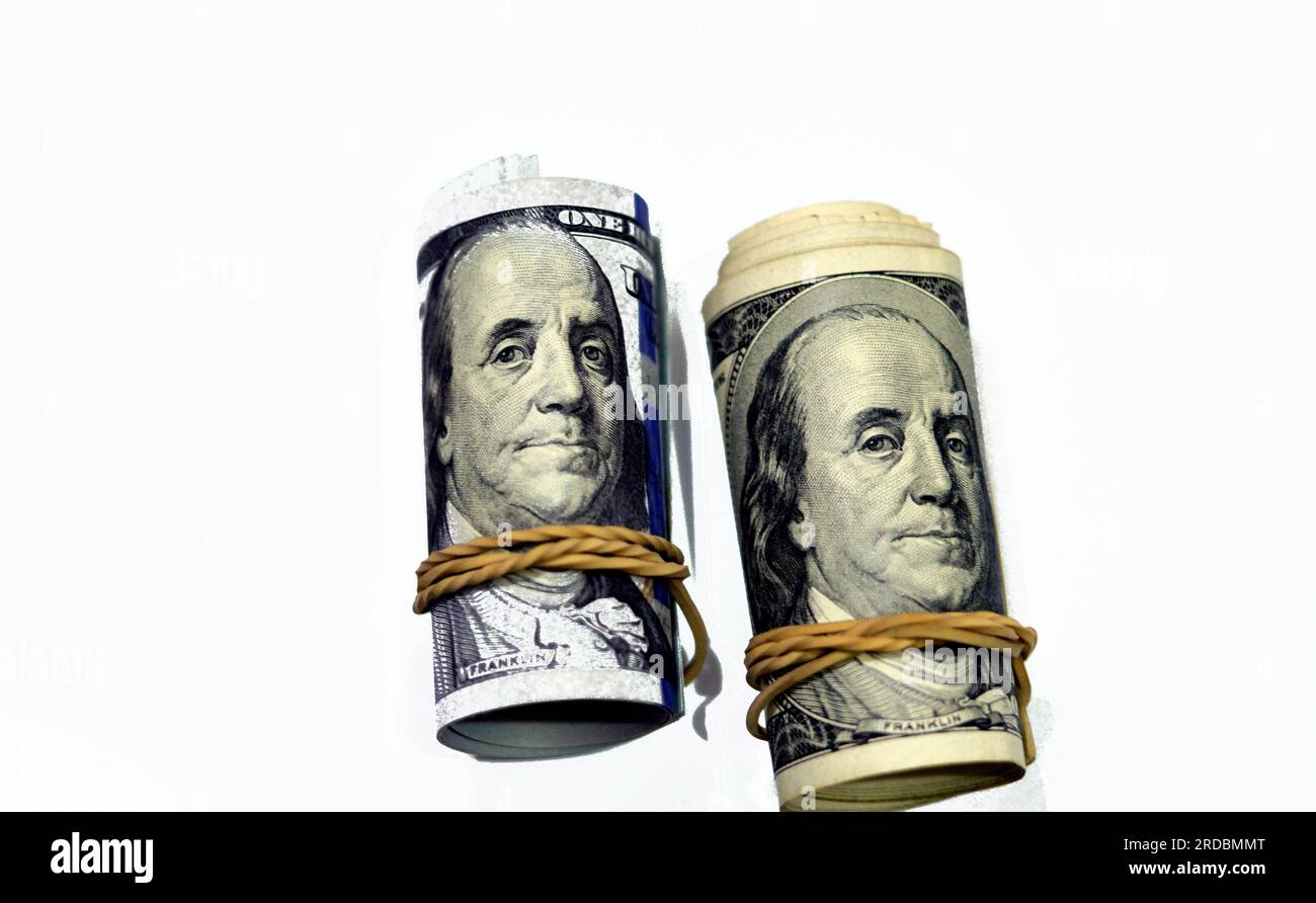 Rolls of 100 one hundred dollar banknote currency cash money old and ...