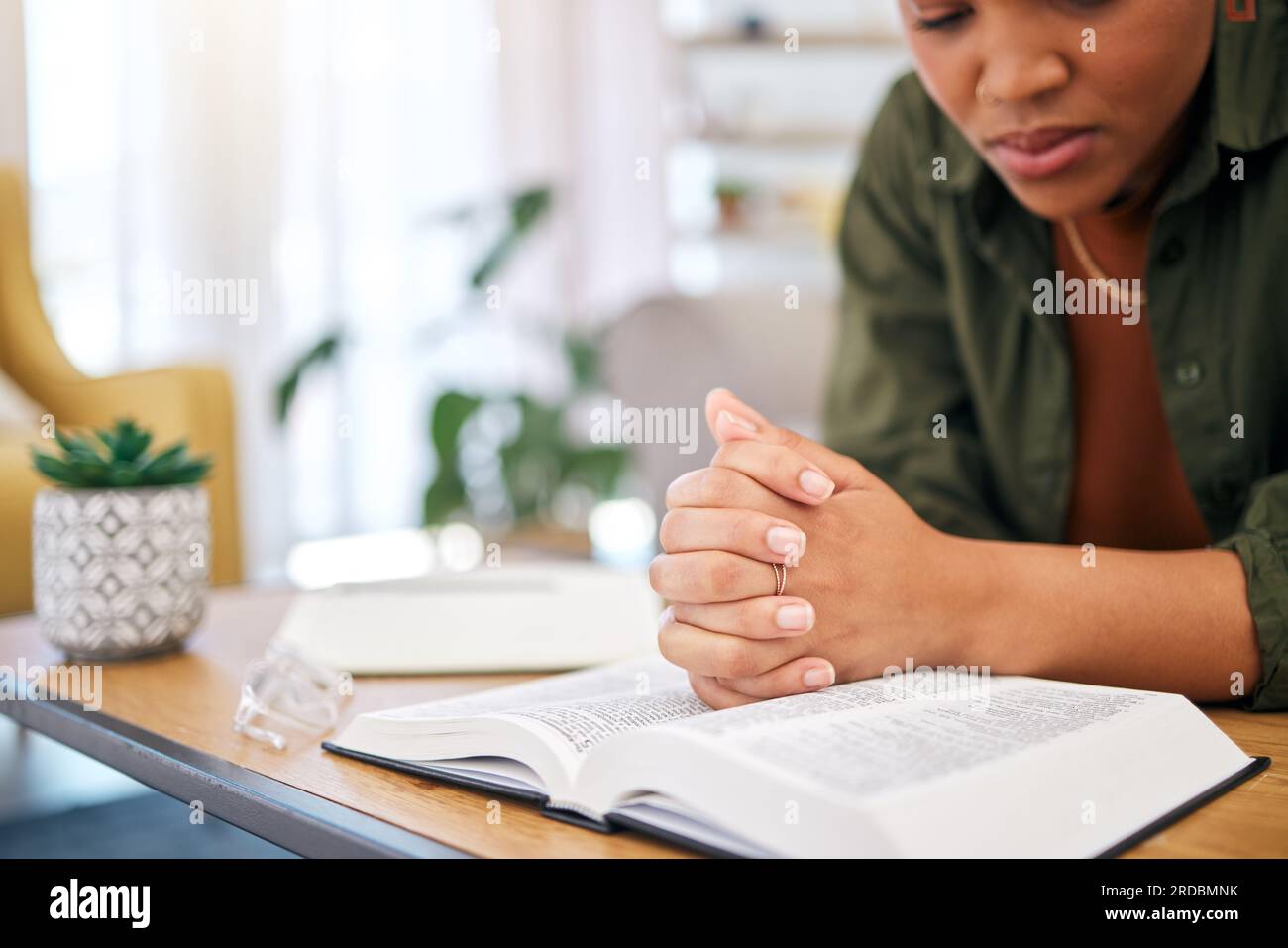 Woman Praying Bible