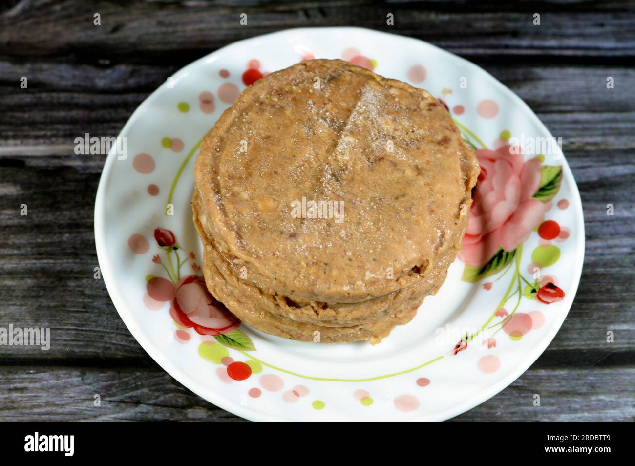 Raw uncooked beef burger ready to be cooked and fried in shallow oil ...