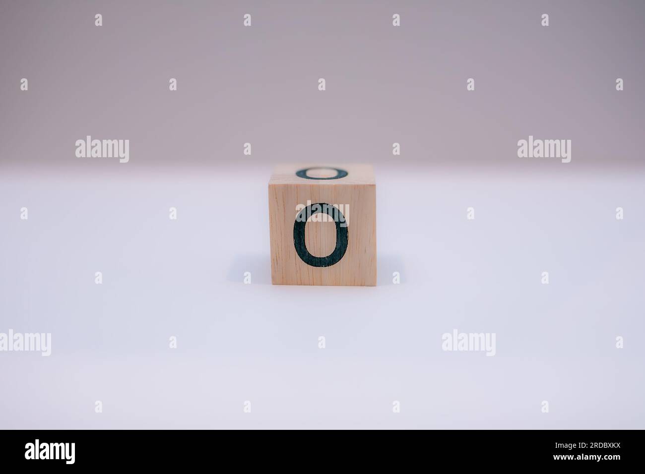 Wooden block written "O" with a white background Stock Photo - Alamy