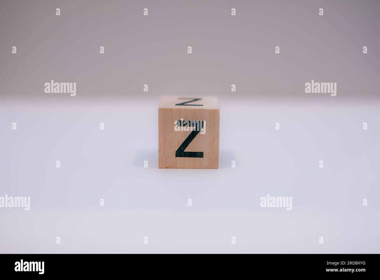 Wooden block written "Z" with a white background Stock Photo - Alamy