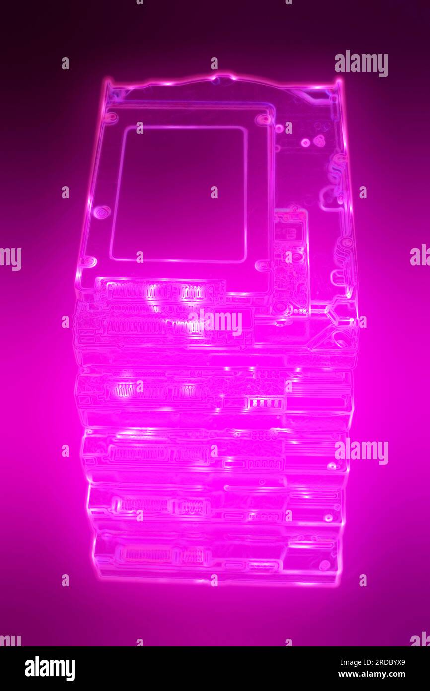 Digital effect x-ray pink view multiple HDD hard disk drives modern ... Digital effect x-ray pink view multiple HDD hard disk drives modern ...