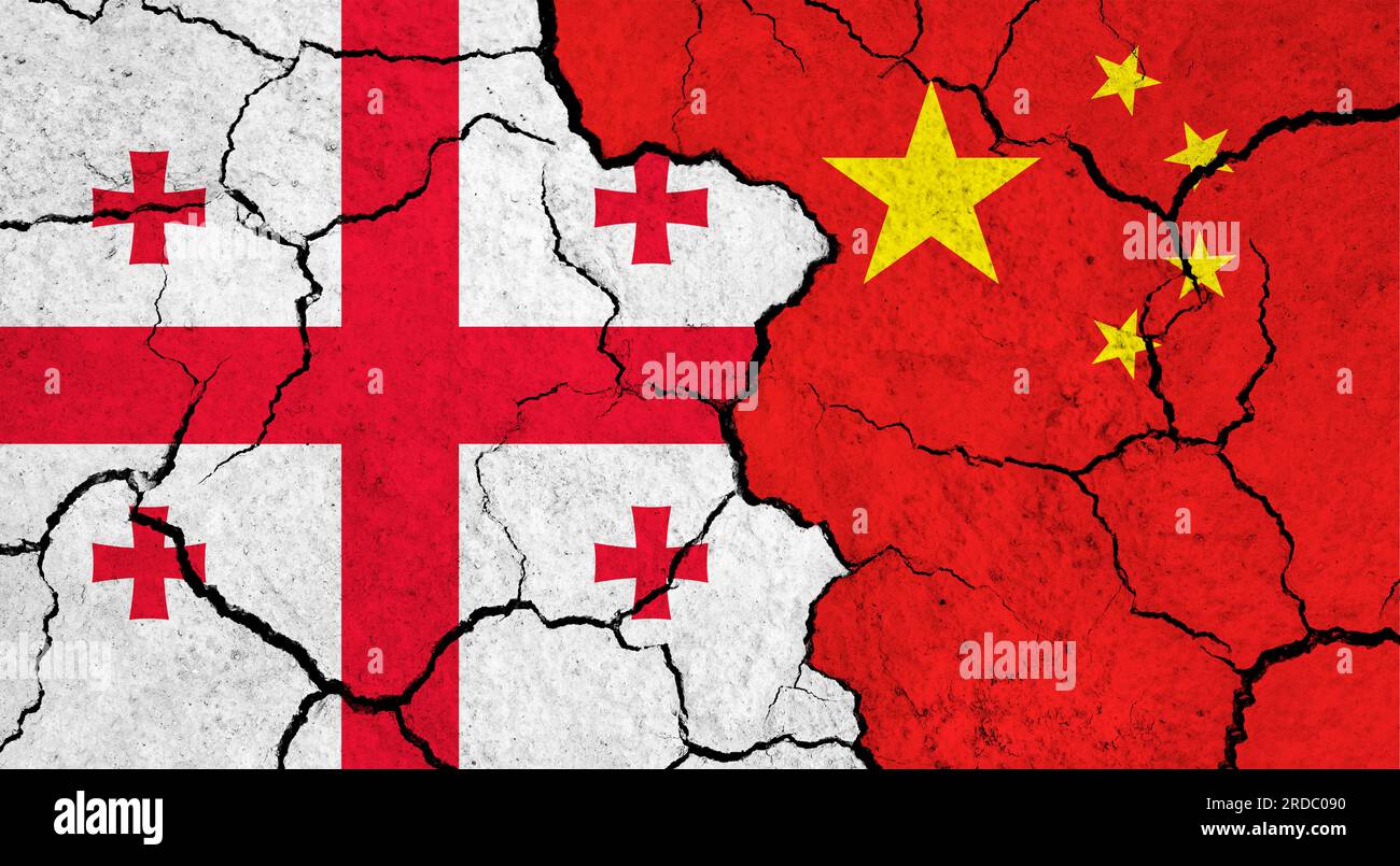 Flags of Georgia and China on cracked surface - politics, relationship ...