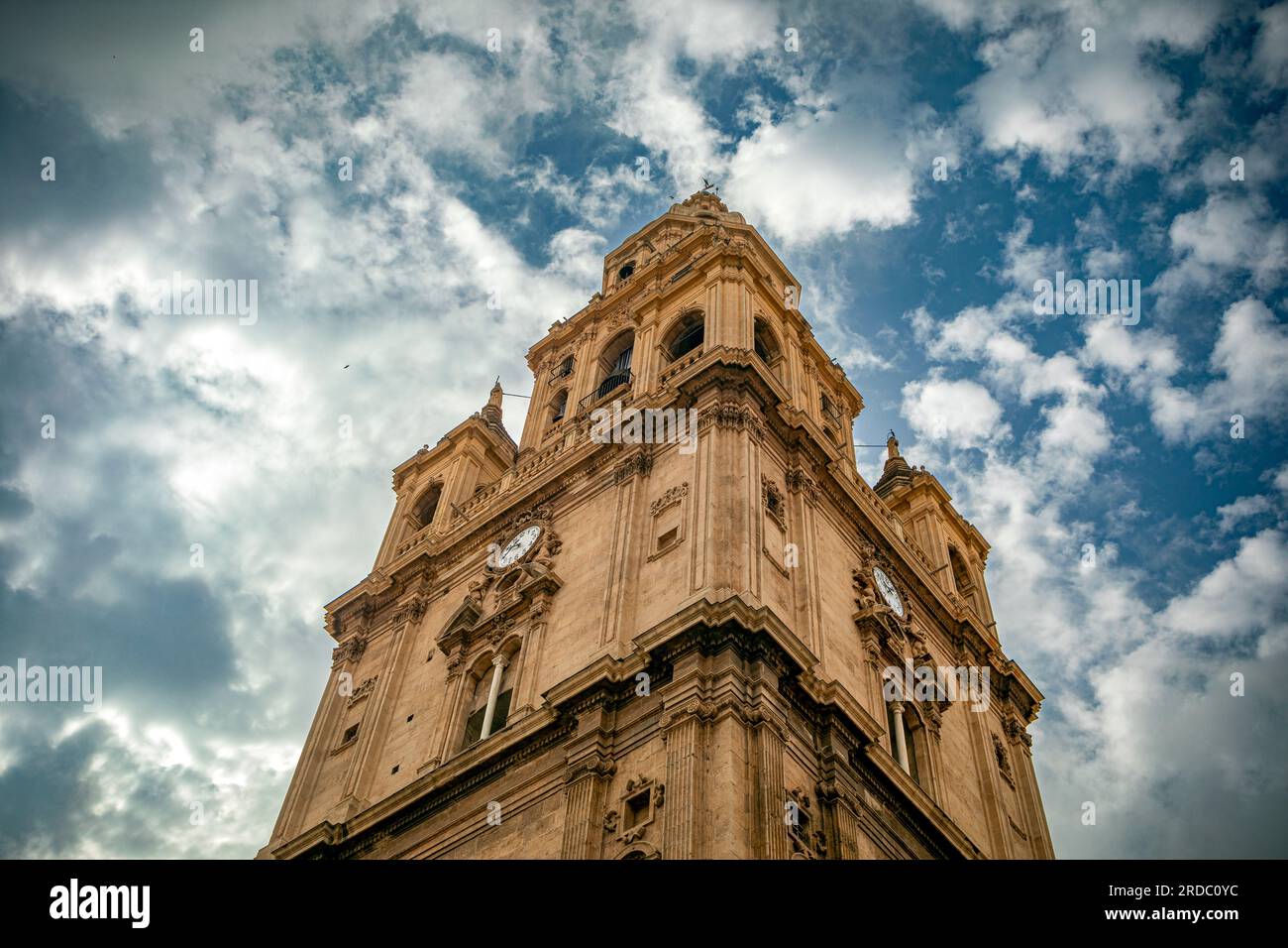 Horizontal view from below of the high tower of the Murcia cathedral ...