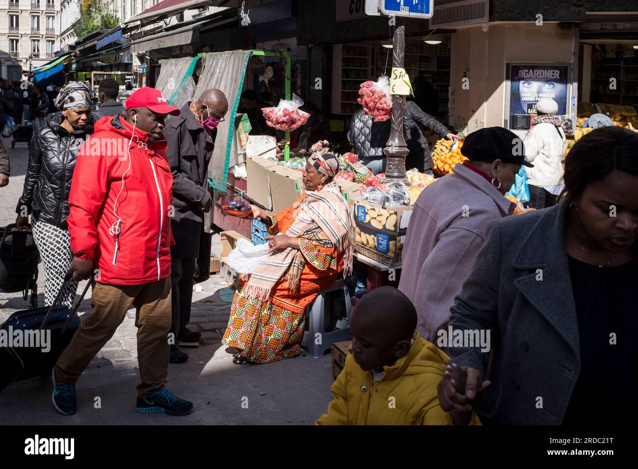 People do crowd the streets doing their shopping in the largely North ...