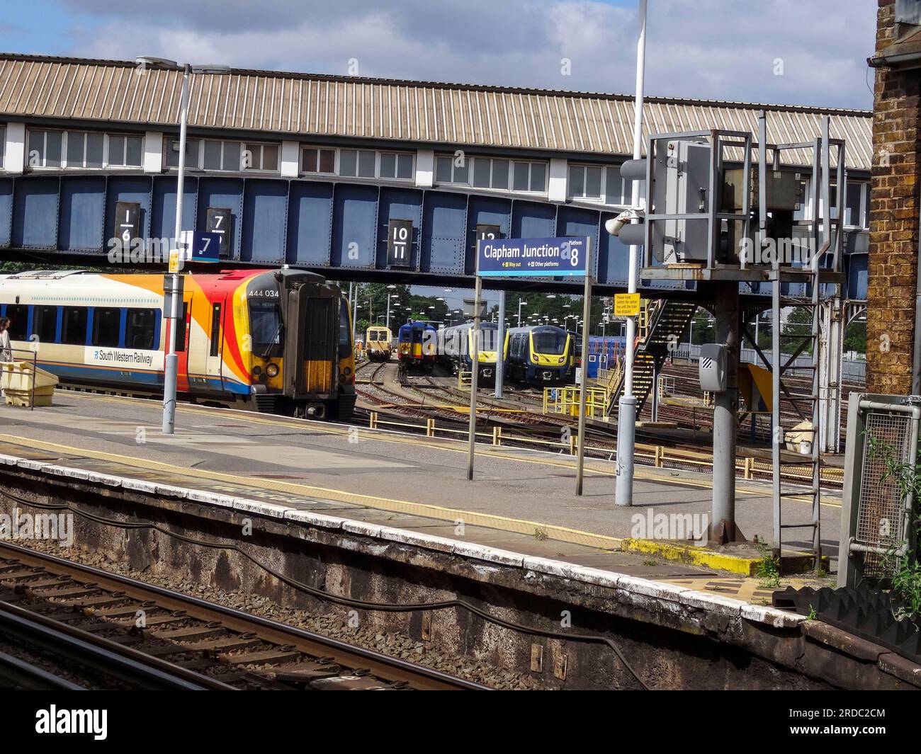 Section of platform at Clapham Junction railway station with train ...