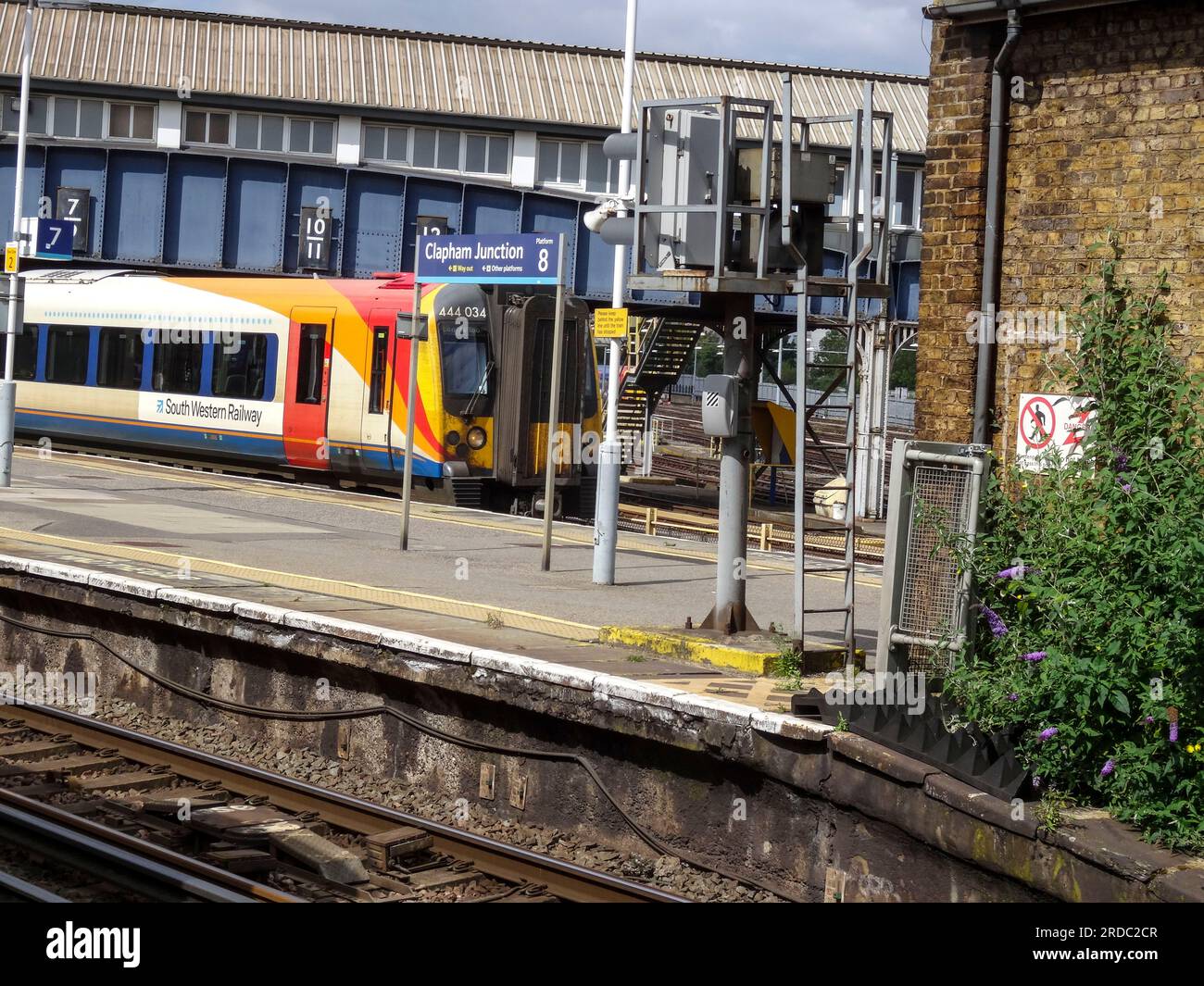 Section of platform at Clapham Junction railway station with train ...