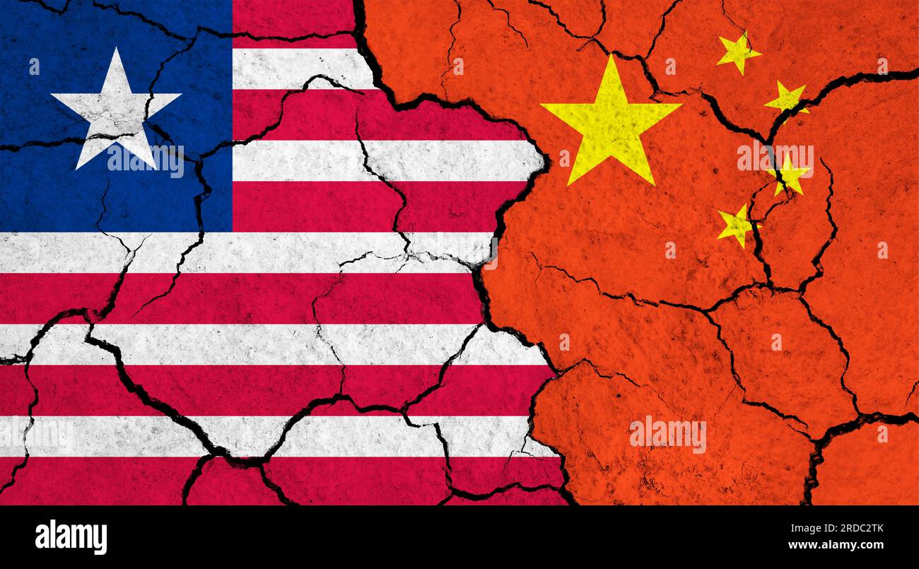 Flags of Liberia and China on cracked surface - politics, relationship ...