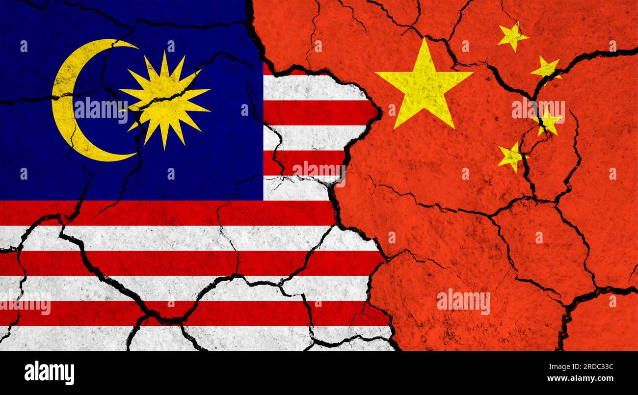 Flags of Malaysia and China on cracked surface - politics, relationship ...
